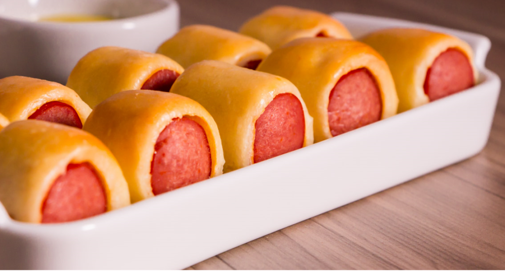 Enrolado de Salsicha (mini) – Pastelaria Marília de Dirceu
